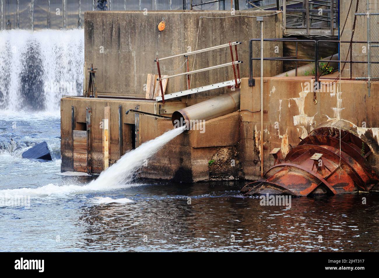 Water discharge pipes into the Nashua River at Jackson Falls Dam in ...