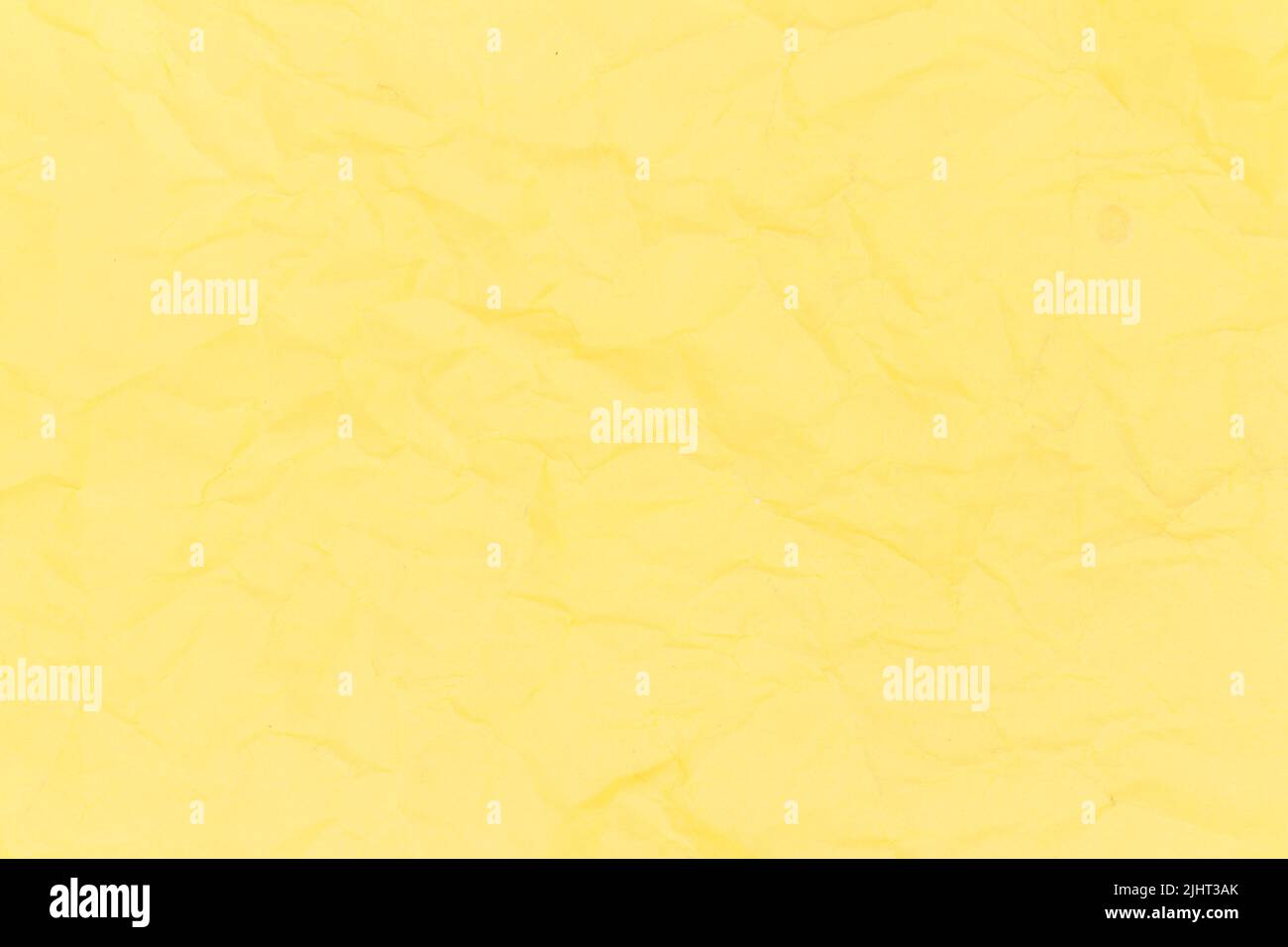 yellow crumpled paper texture background Stock Photo - Alamy