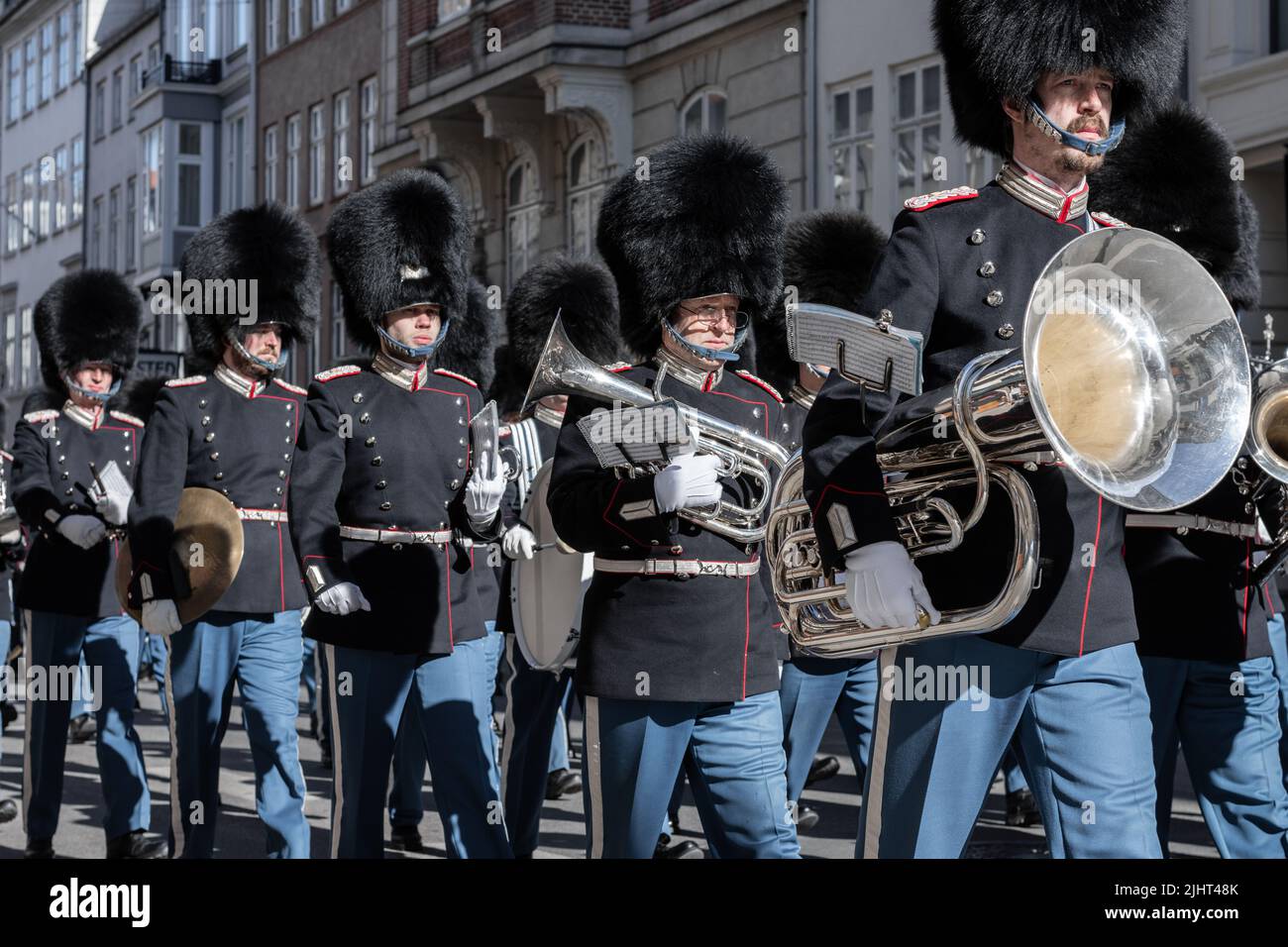 Spring parade on the streets of Copenhagen Denmark. People in uniforms ...