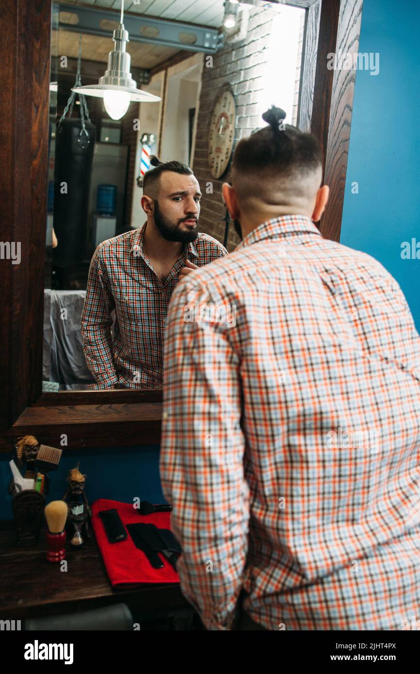 Man looking himself in mirror hi-res stock photography and images - Alamy