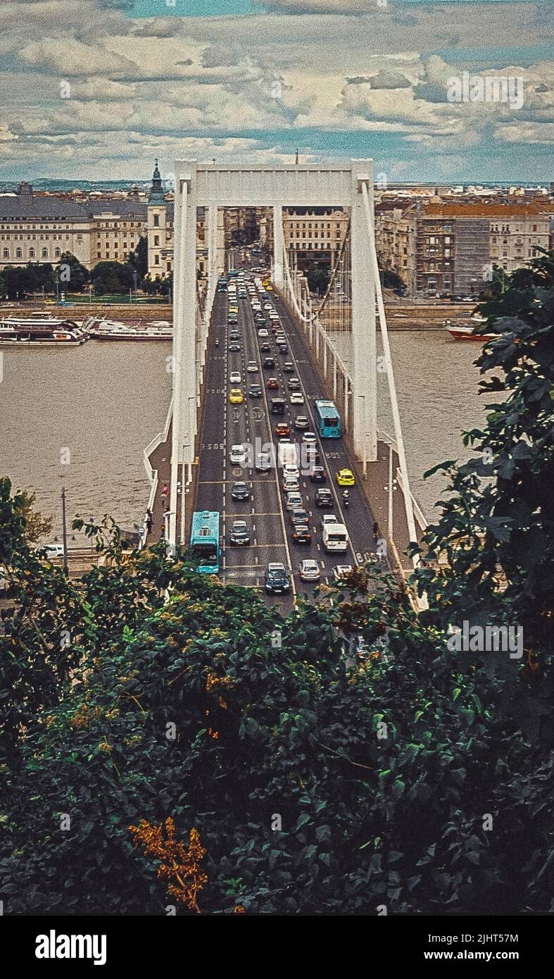 An aerial view of traffic on Elisabeth Bridge over the Danube river ...