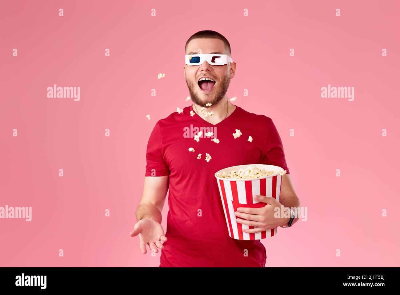 Male student popcorn watching hi-res stock photography and images - Alamy