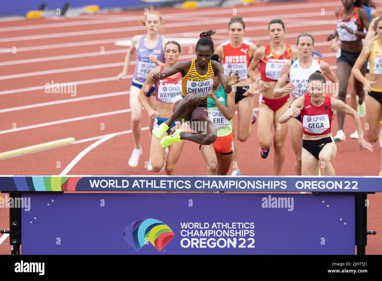 Peruth Chemutai (UGA) leads the pack to the water barrier as she ...