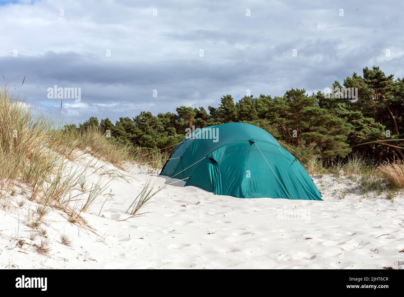 green tent on sand dune Stock Photo - Alamy