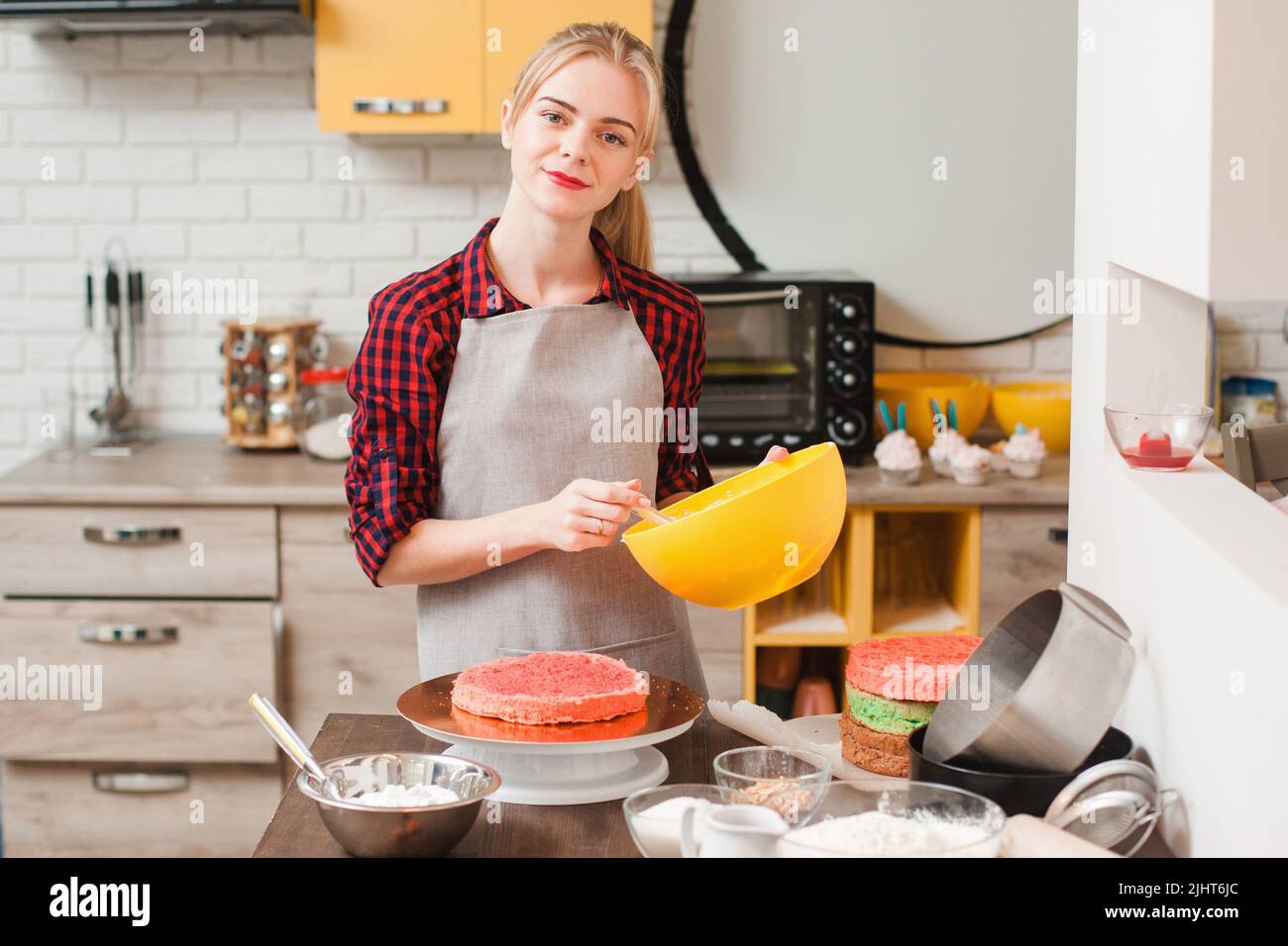 Woman making sweet dessert on kitchen. Culinary Stock Photo - Alamy