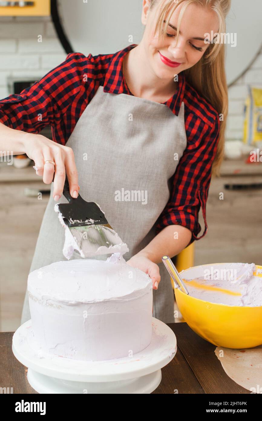 Girl cooking homemade sweets on kitchen. Cookery Stock Photo - Alamy