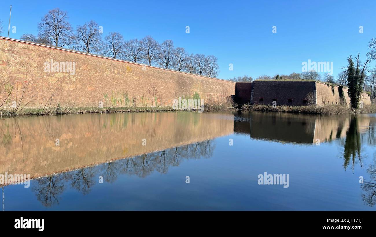 The walls of the gates of the Spandau Citadel with the reflection on ...