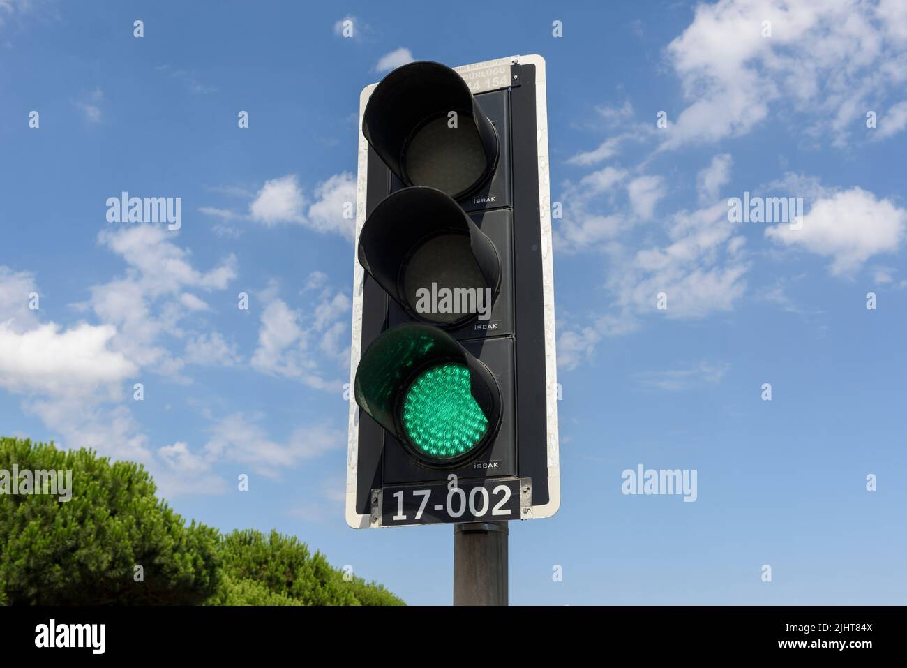 ISTANBUL, TURKEY - JULY 11, 2022: Traffic light with green light ...