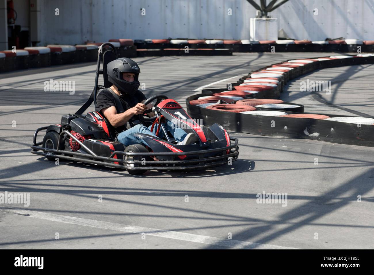 ISTANBUL, TURKEY - JULY 11, 2022: Driver in gear, gloves and helmet ...