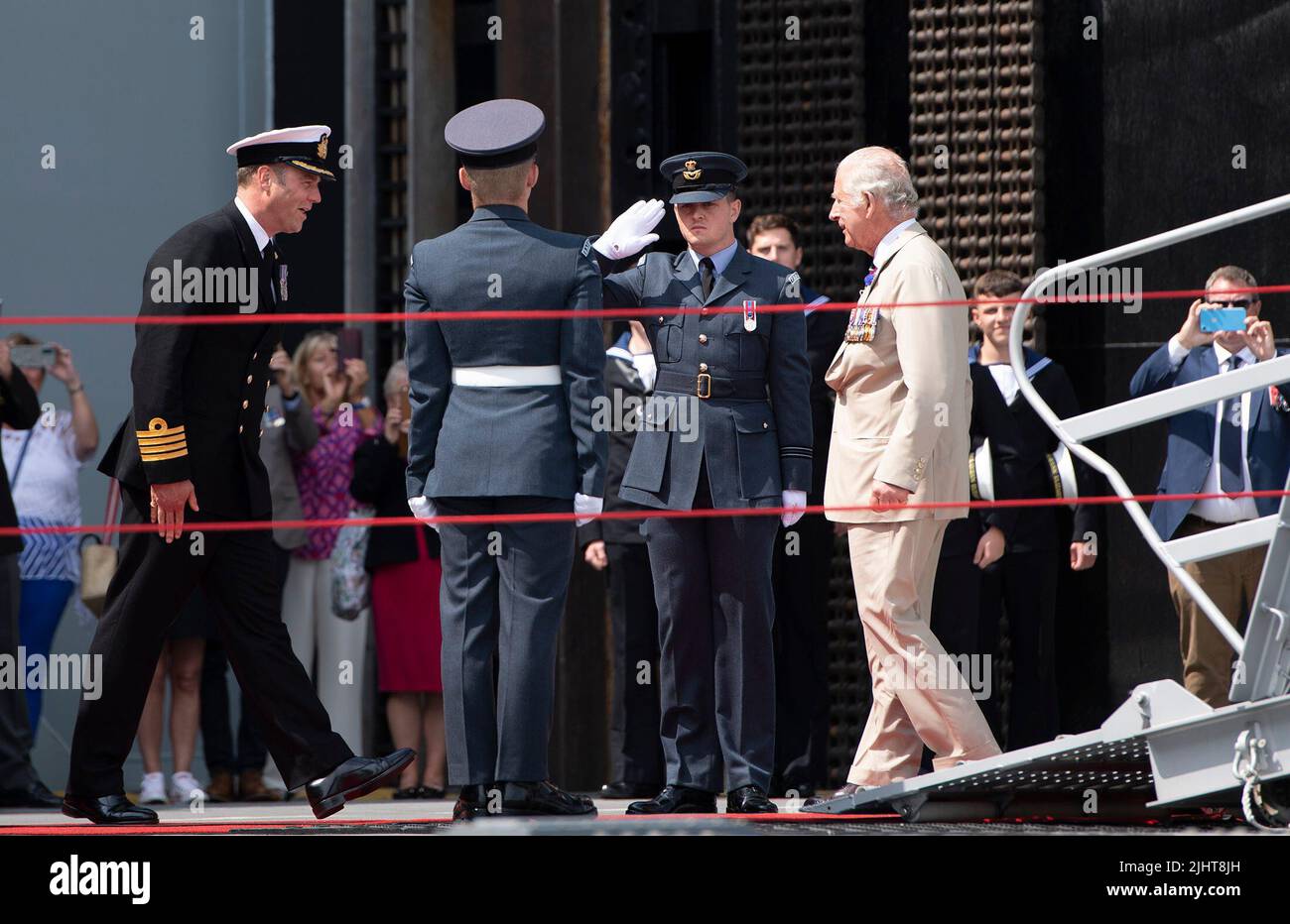 The Prince of Wales (right) is greeted by the president of the South ...