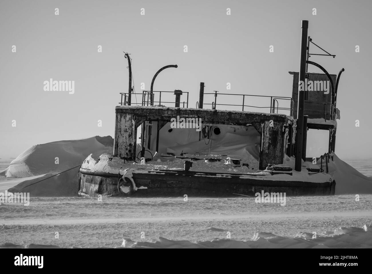 A grayscale of a ruined Ship on a shore Stock Photo - Alamy