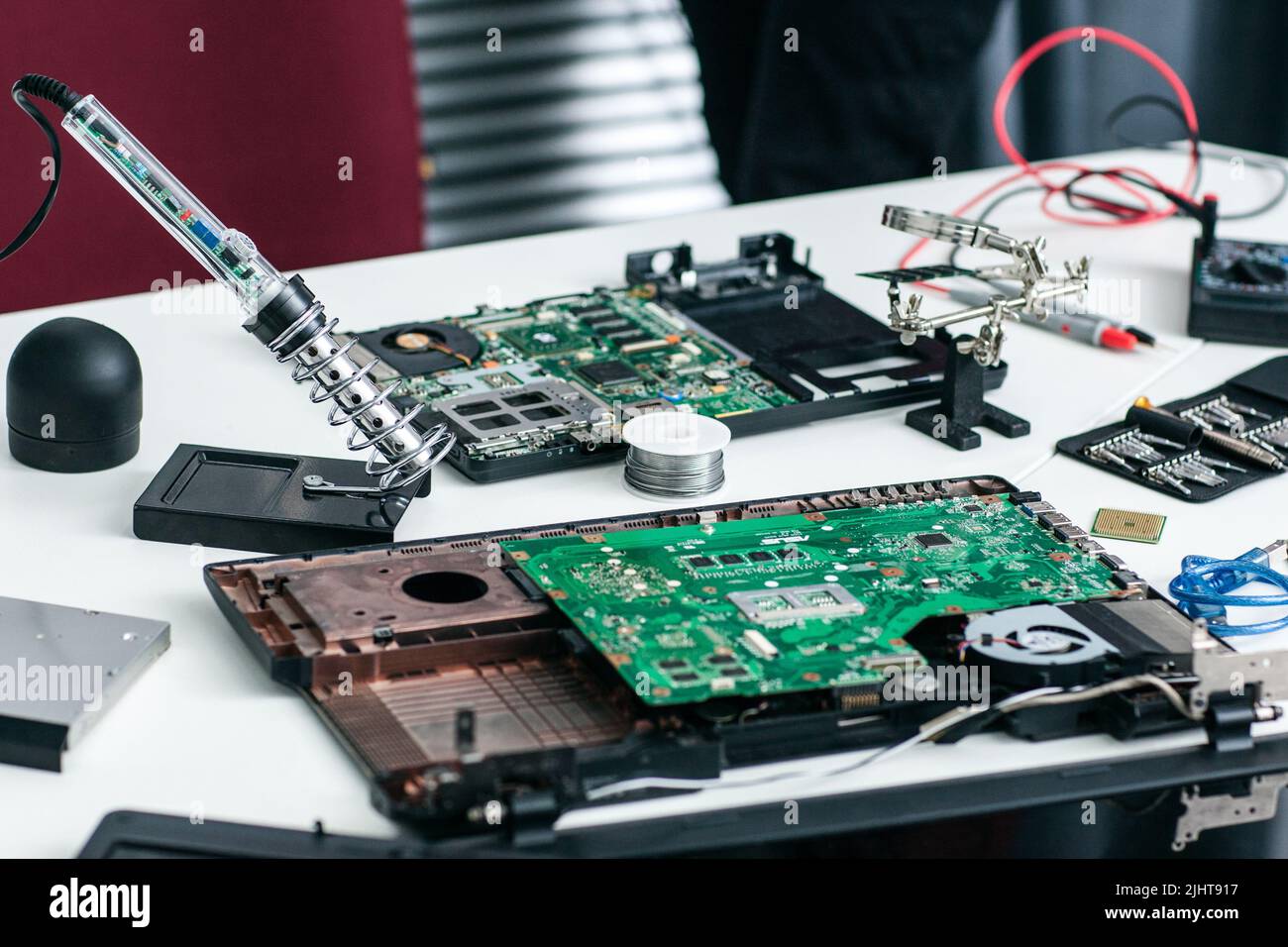 Electronic repairman workplace with components Stock Photo - Alamy