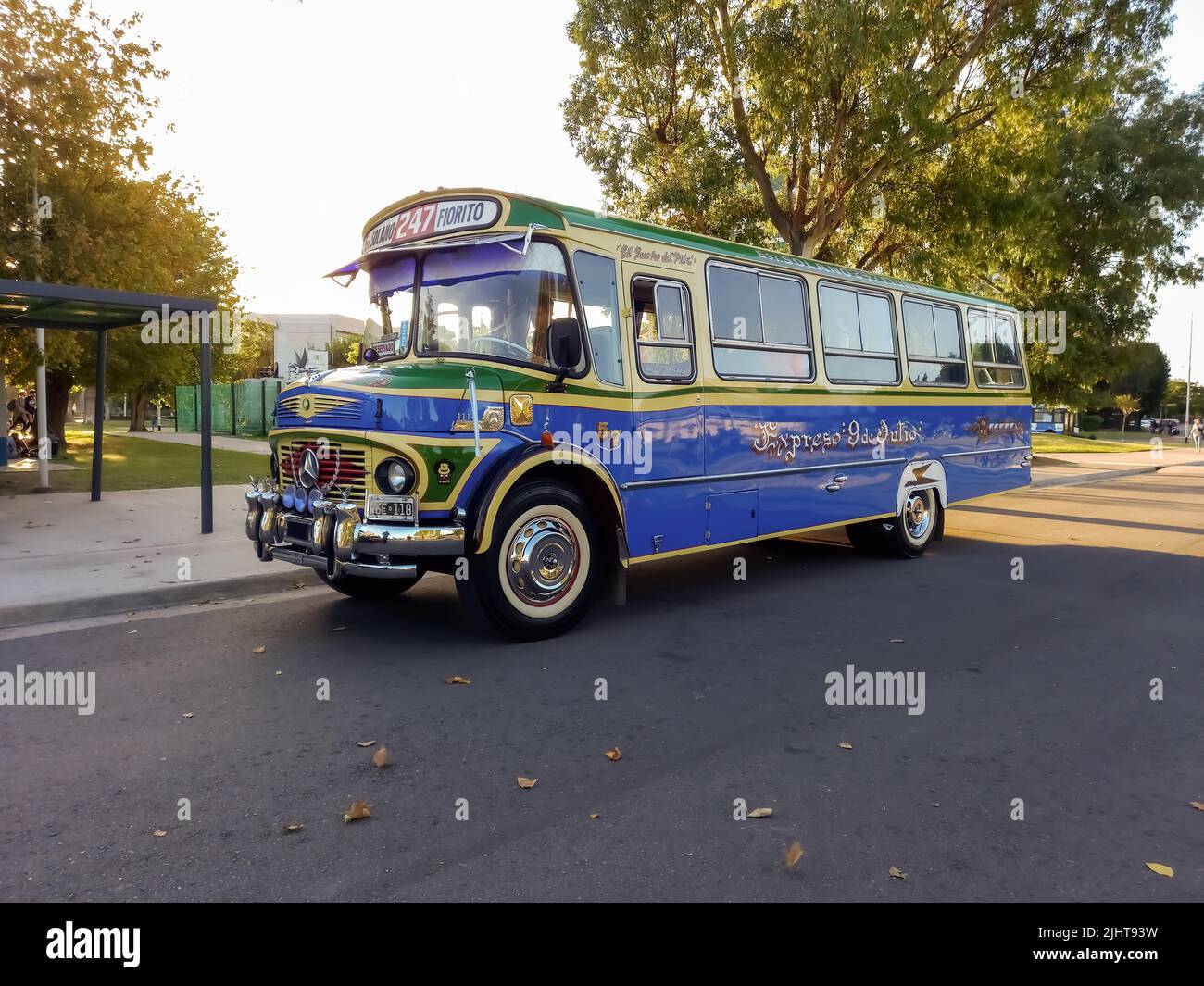 old blue Mercedes Benz 1114 bus parked in the street. Public passenger ...