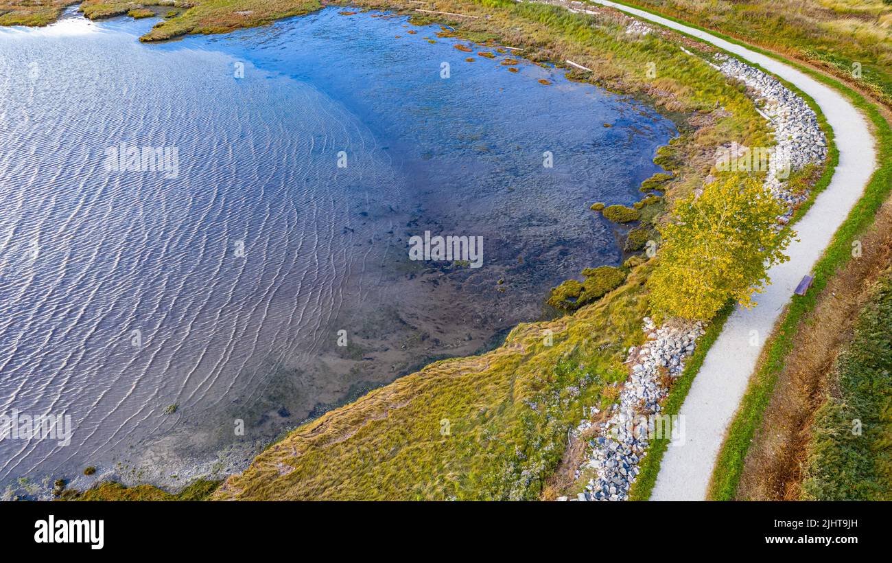 The aerial of the small coastal road in Mud Bay Park, Surrey, Canada ...