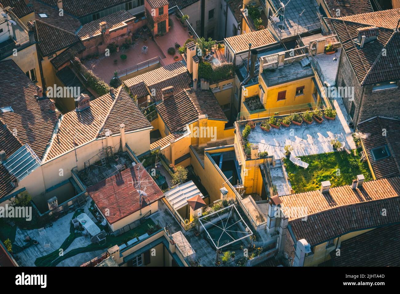 A bird's-eye view of the colorful rooftops of Bologna, Italy in the ...