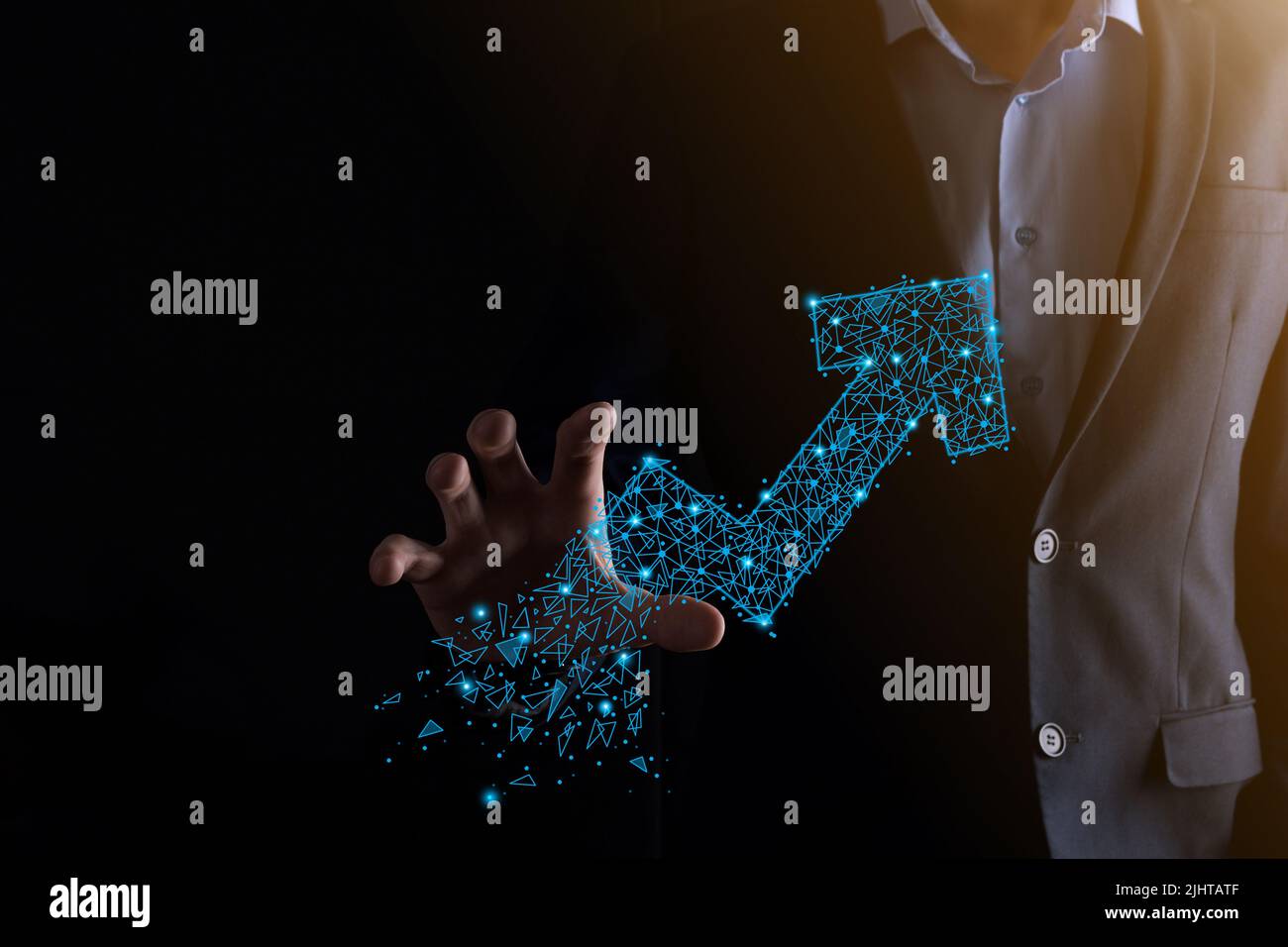 Businessman hold graph, arrow of positive growth icon.pointing at ...