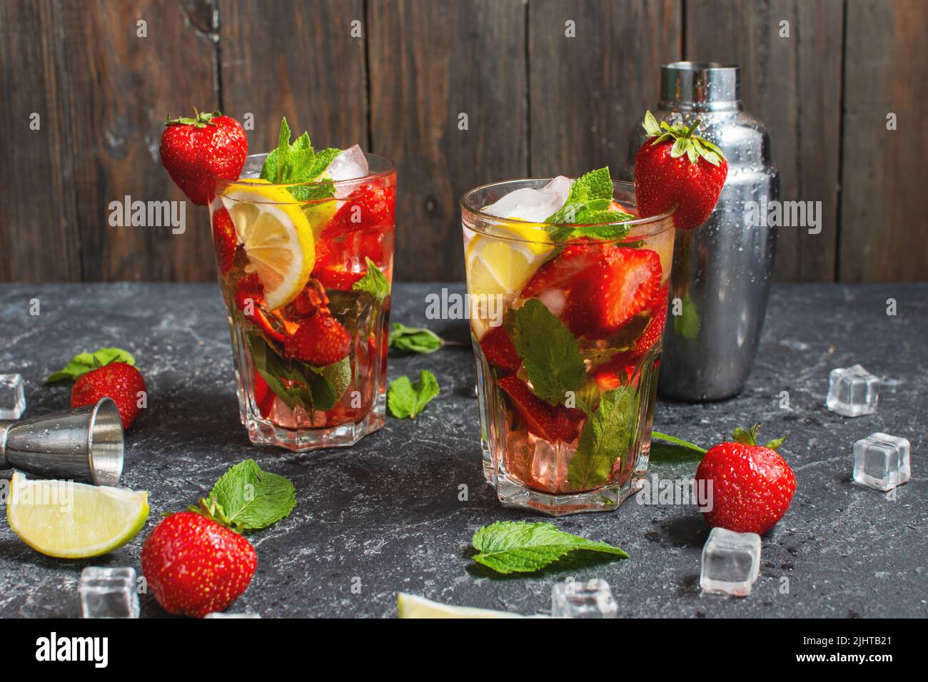 Summer refreshing mojito cocktail with strawberry, mint and lime with ...