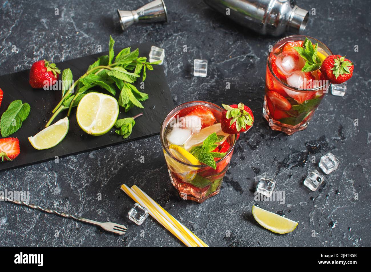 Summer refreshing mojito cocktail with strawberry, mint and lime with ...
