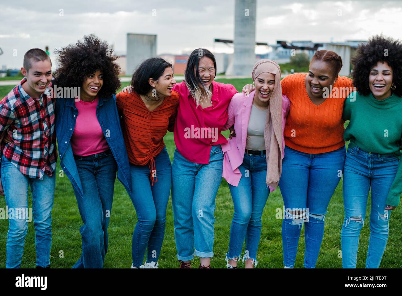 Group of lifestyle women from different cultures having fun outdoors ...