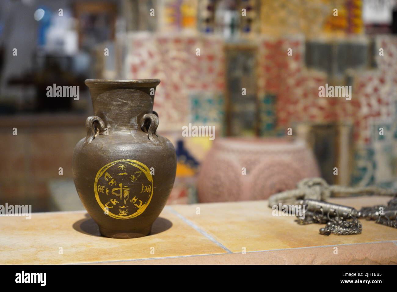 Pottery, a vase, a jug of brown clay, and the founding day of Saudi ...