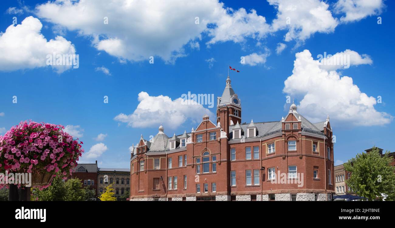 Red brick city hall with a clock tower in the scenic historic center in ...