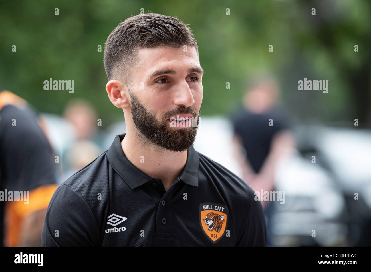 New signing Doğukan Sinik of Hull City arrives at The MKM Stadium ahead ...
