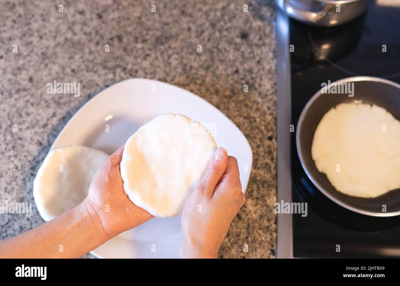 Arepas making hi-res stock photography and images - Alamy