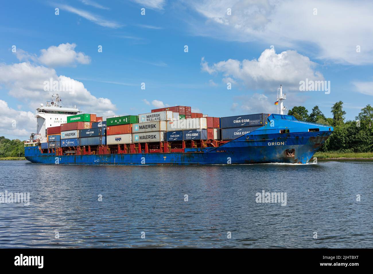 container ship ORION in the Kiel Canal Stock Photo - Alamy