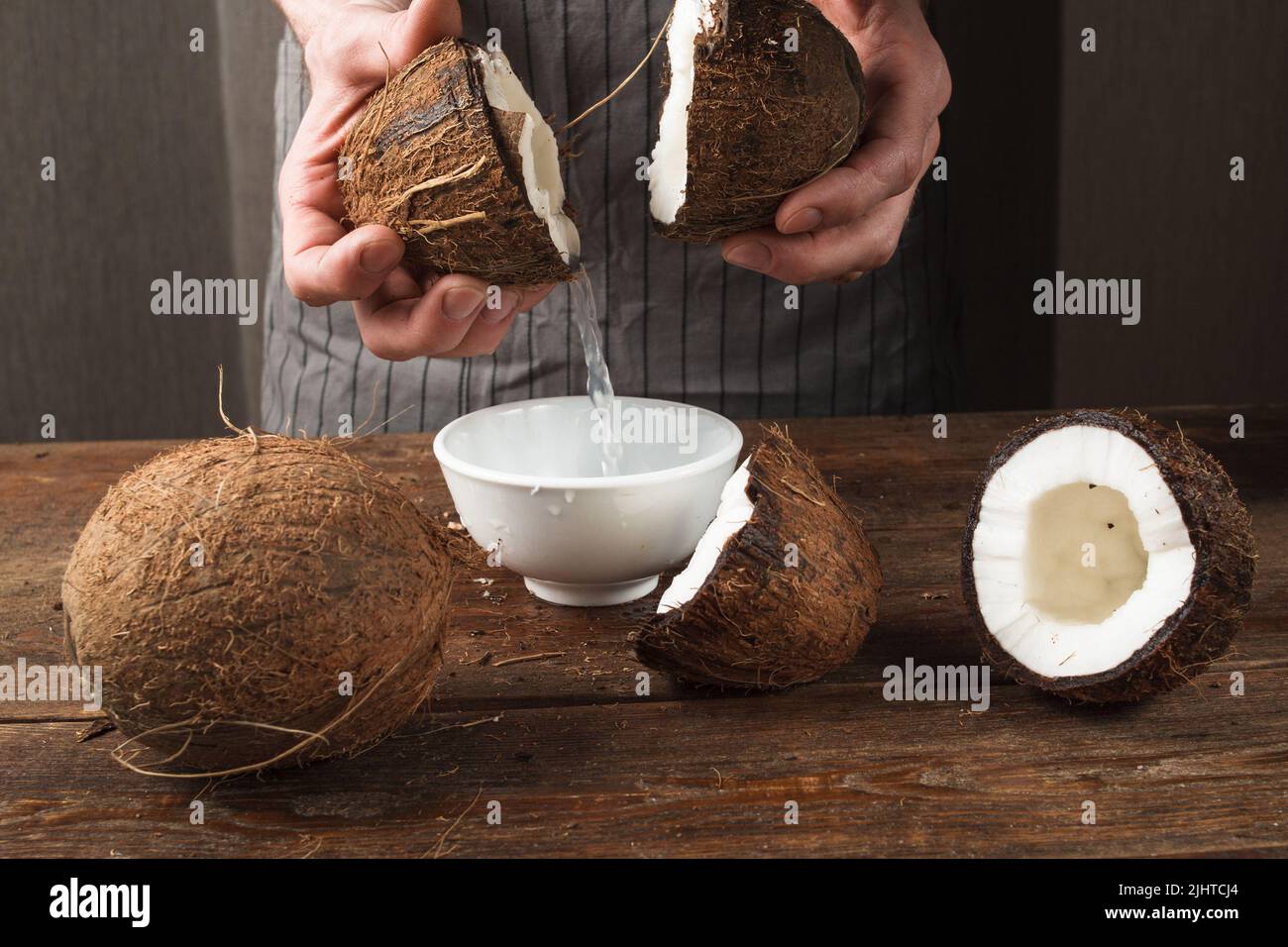 Woman pouring coconut milk hi-res stock photography and images - Alamy
