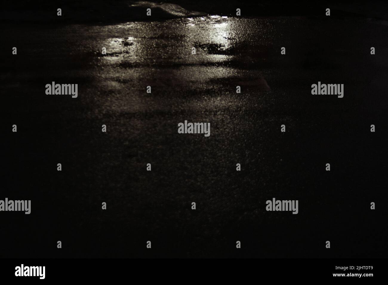 Urban raining night light concept. Bad weather in the big city ...