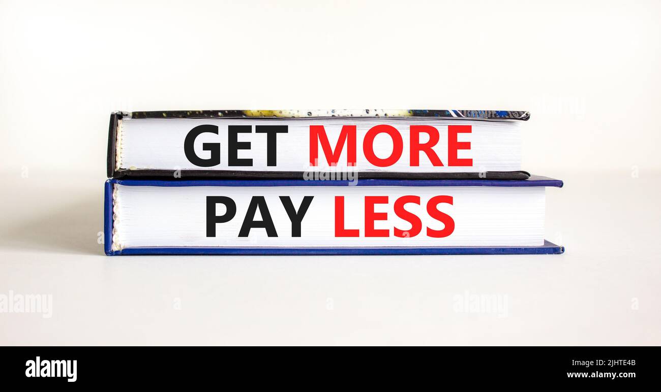 Get more pay less symbol. Concept words Get more pay less on books on a ...