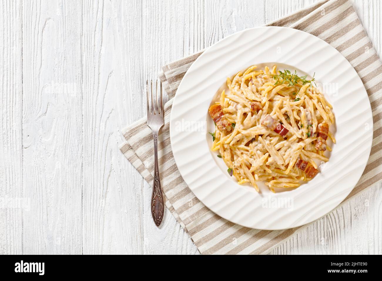 delicious capunti pasta in cream pecorino cheese and pancetta sauce on ...