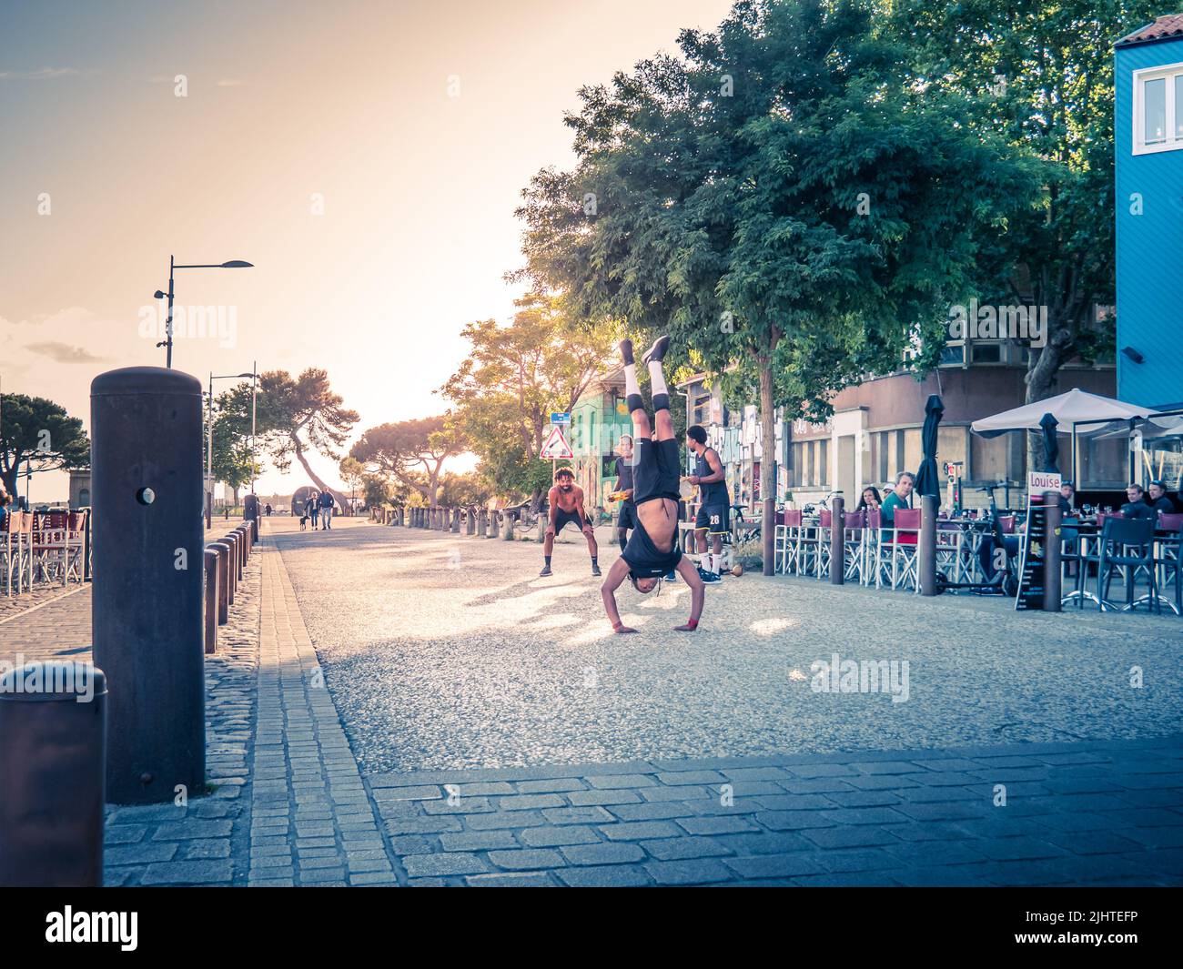 Il de Re, France June 2022. African Americans Capoeira dancers in the ...