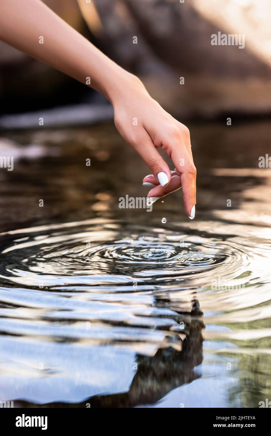 Finger touching water surface reflection hi-res stock photography and ...