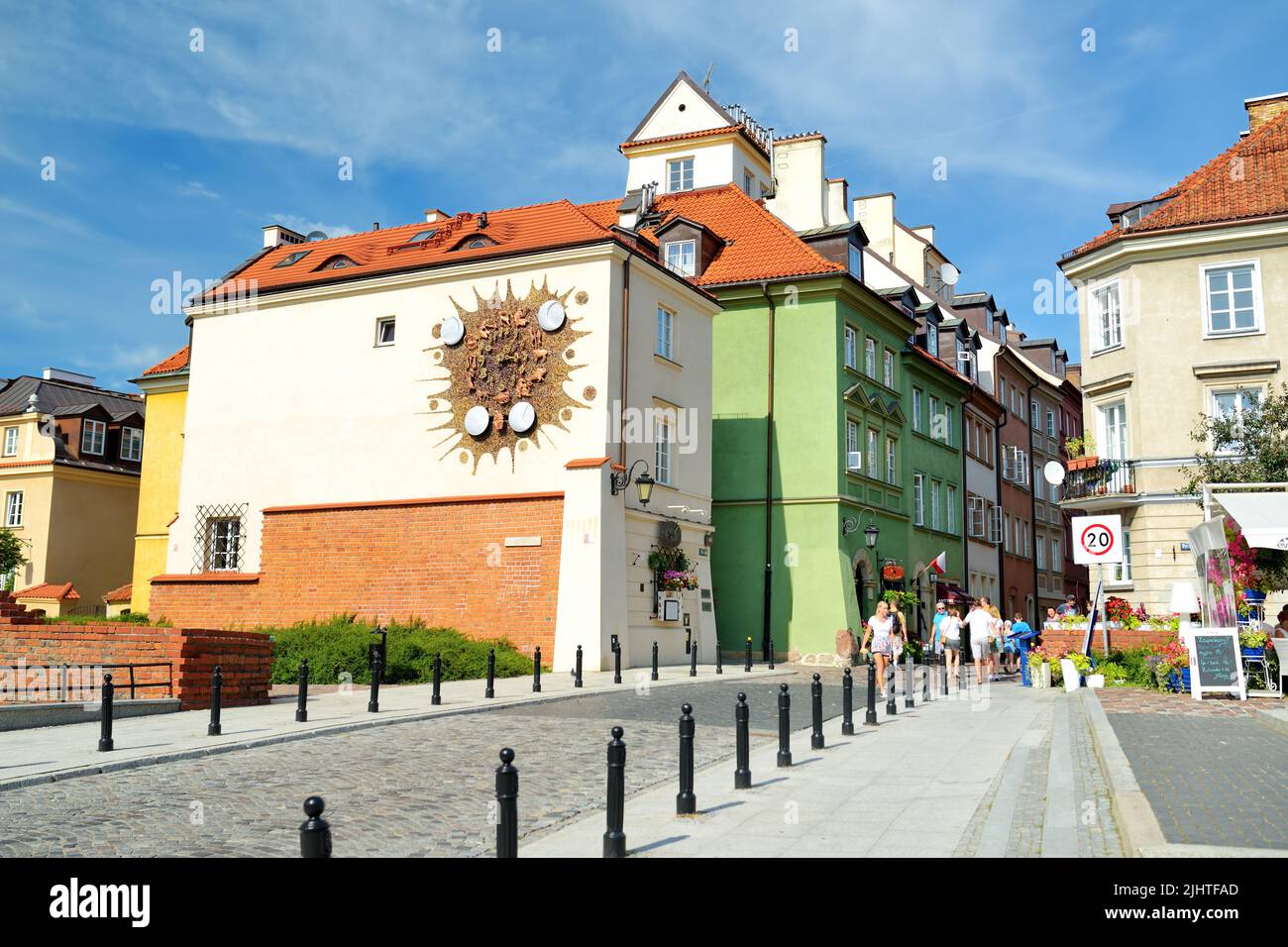 WARSAW, POLAND - AUGUST 2021: Tourists explore beautiful streets of the ...
