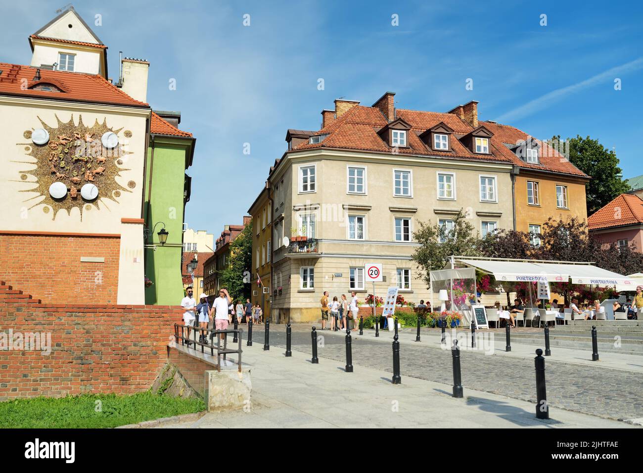 WARSAW, POLAND - AUGUST 2021: Tourists explore beautiful streets of the ...