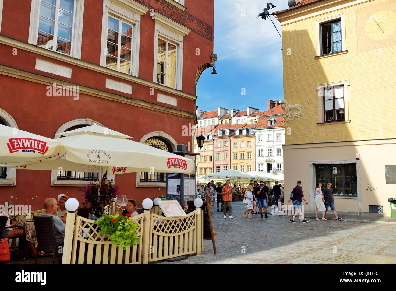 WARSAW, POLAND - AUGUST 2021: Tourists explore beautiful streets of the ...