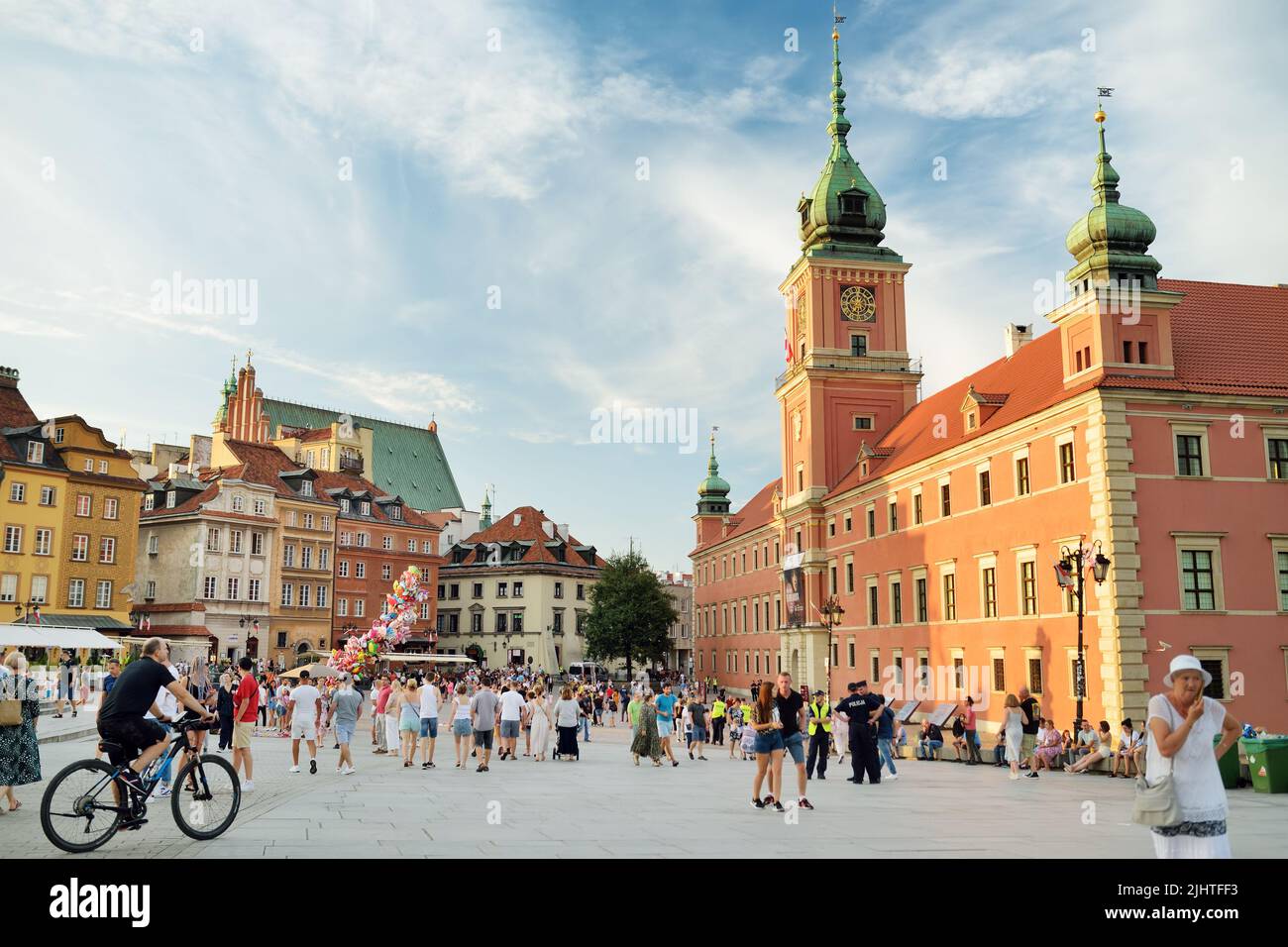 WARSAW, POLAND - AUGUST 2021: Tourists explore beautiful streets of the ...