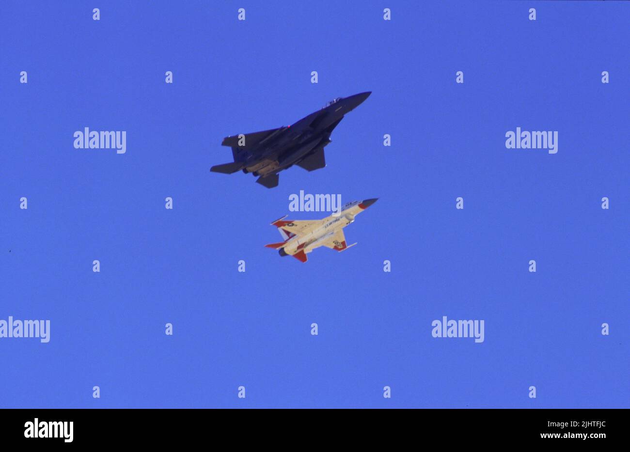 F-15 and F-16 in formation in the skies over Edwards Air Force Base in ...