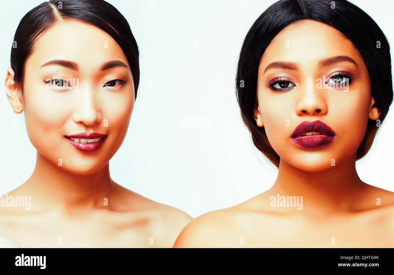 different nation woman: african-american and asian together isolated on ...