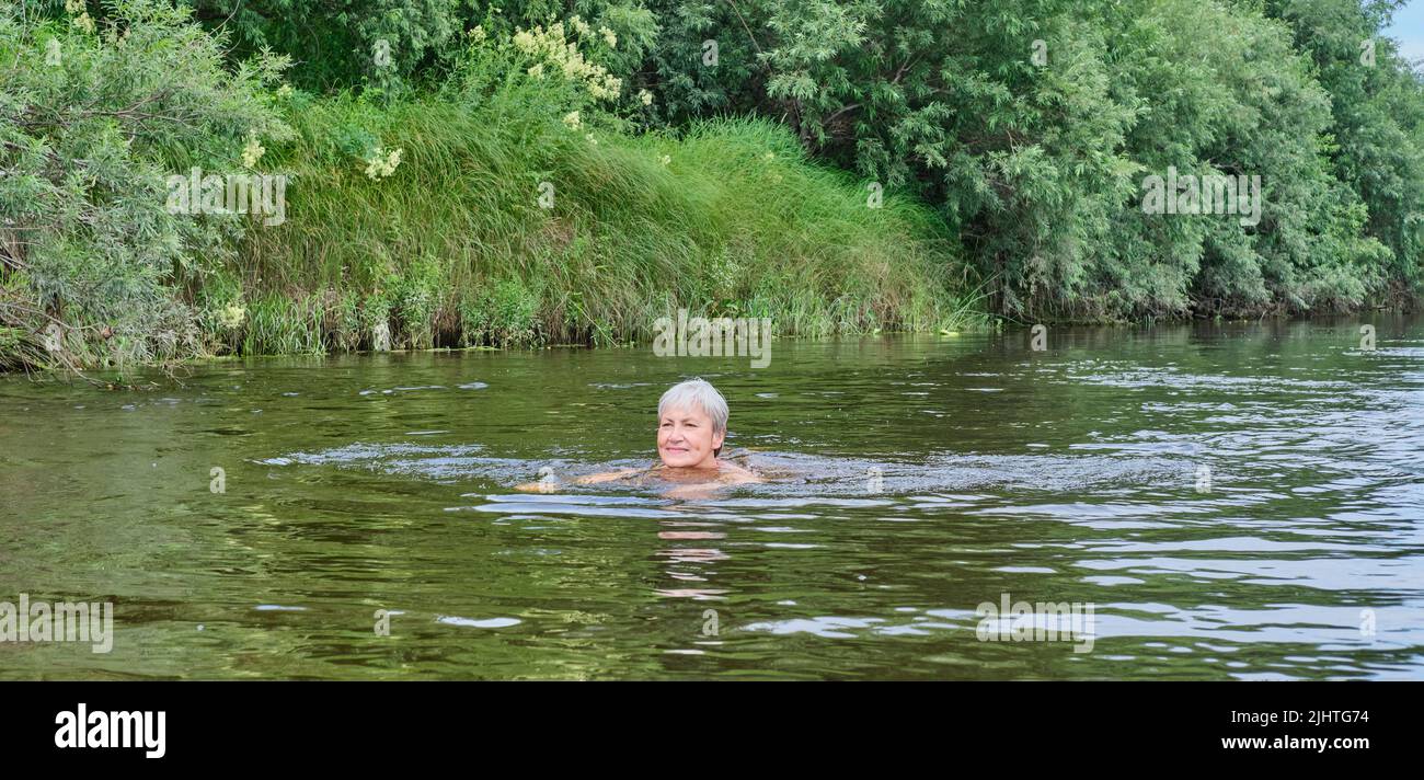 Pond swimming woman hi-res stock photography and images - Alamy