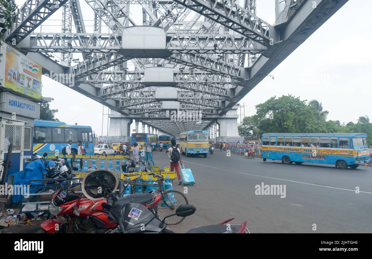 Howrah Bridge traffic on a busy afternoon. Howrah Bridge Kolkata India ...