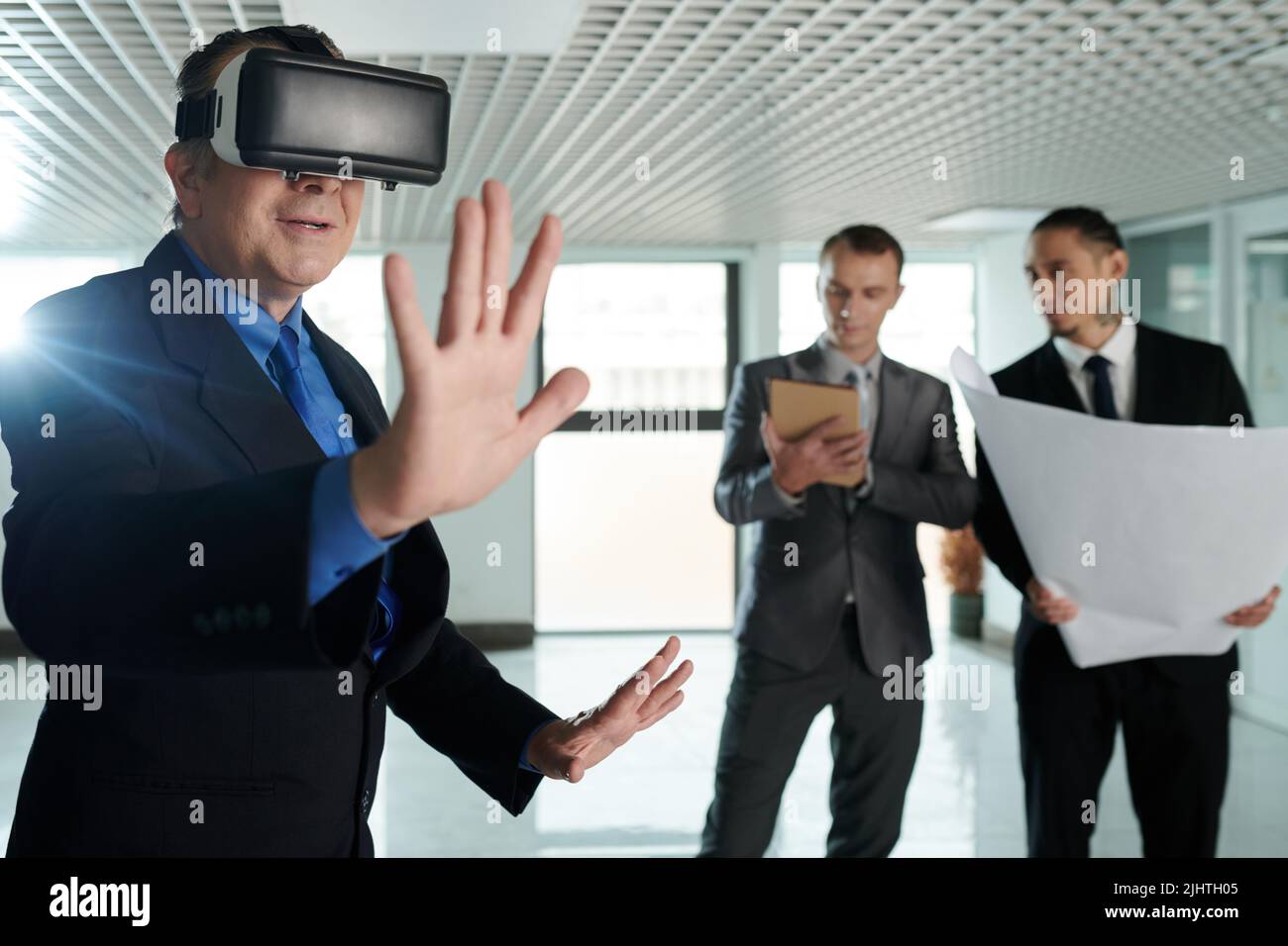 Product developers letting investor to test new application in virtual ...