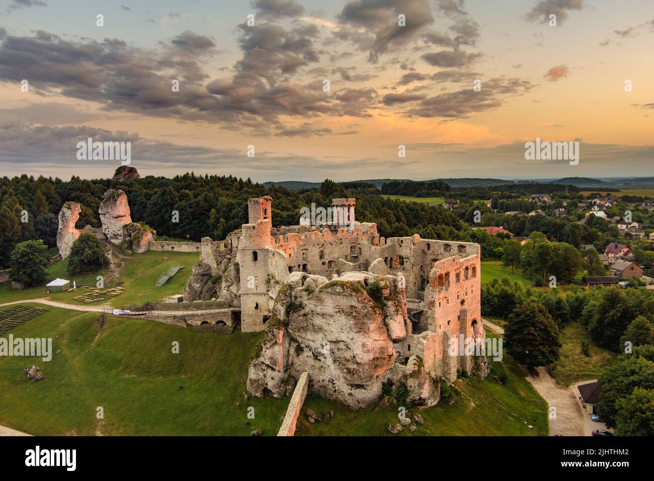 Aerial sunset view of Ogrodzieniec Castle, a ruined medieval castle in the south-central region ...