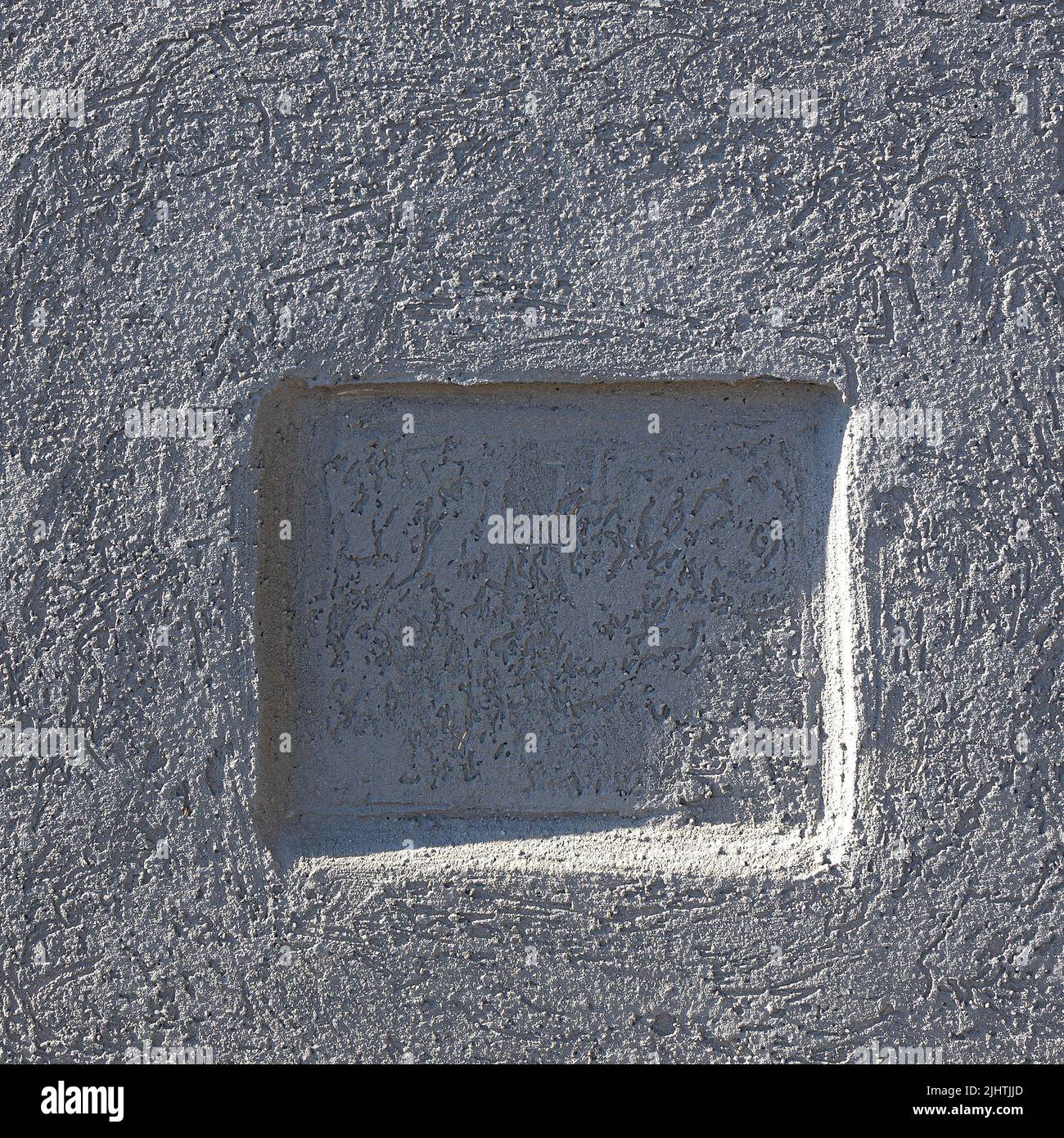 Square niche in a gray stone wall, cement texture Stock Photo - Alamy