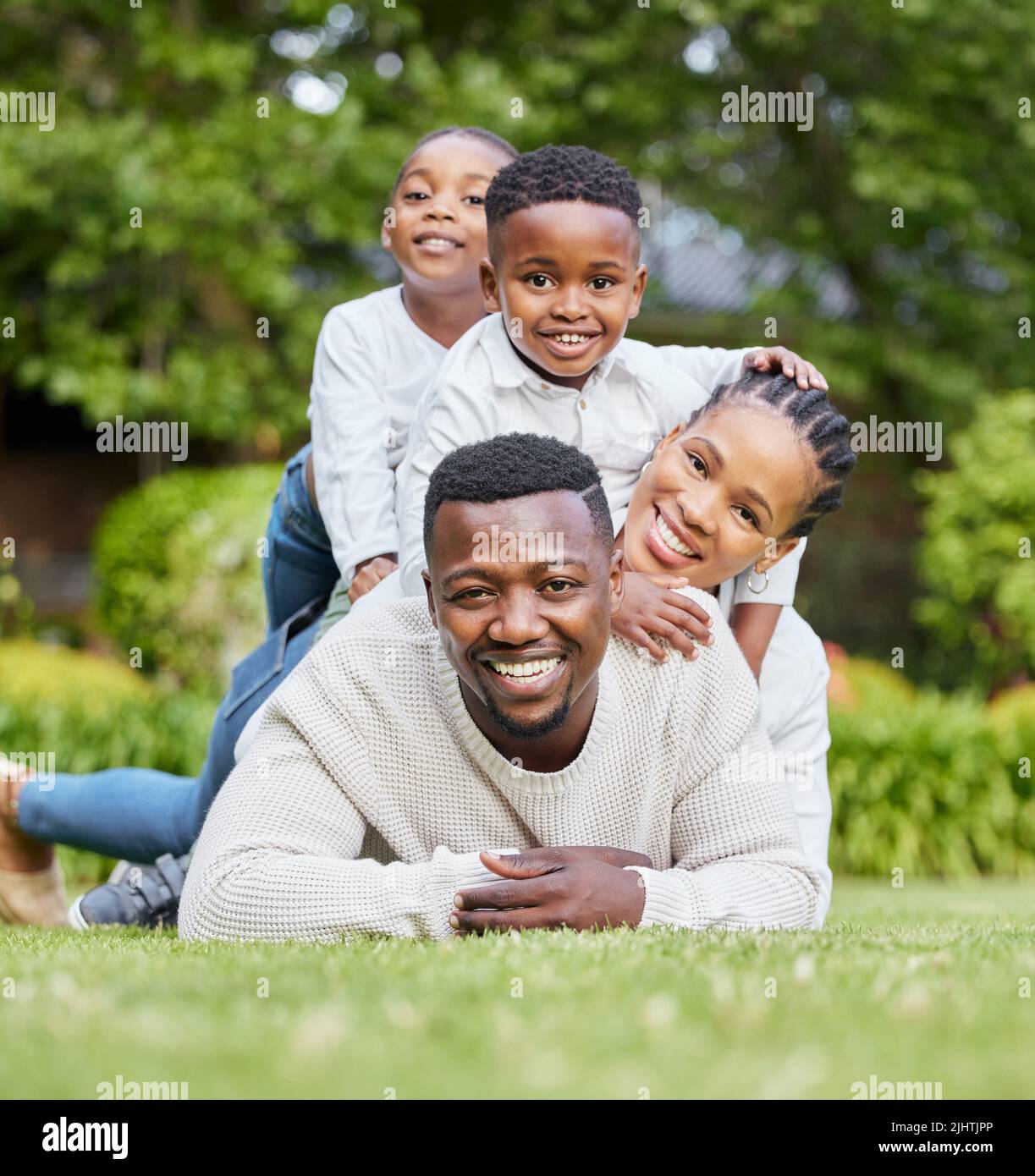 Family never leave each others side. a family bonding outside Stock ...
