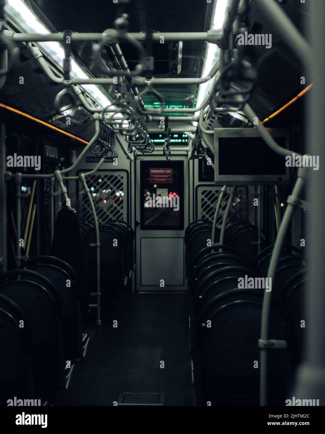 An interior of an empty bus at midnight Stock Photo - Alamy