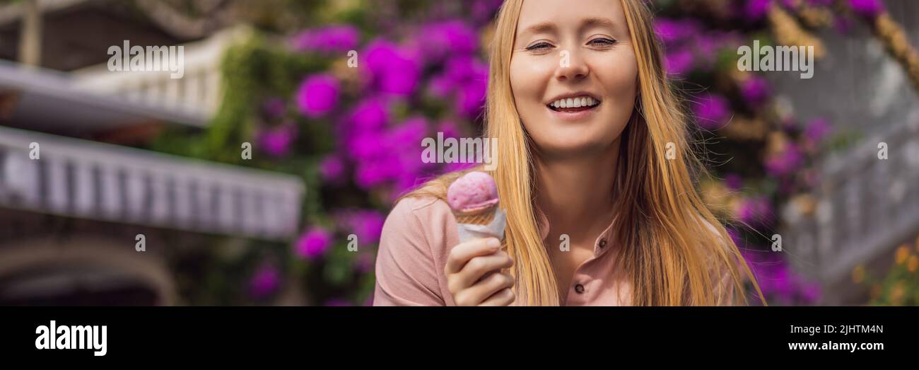 Close up of pretty tourist girl eating traditional gelato italian ice ...
