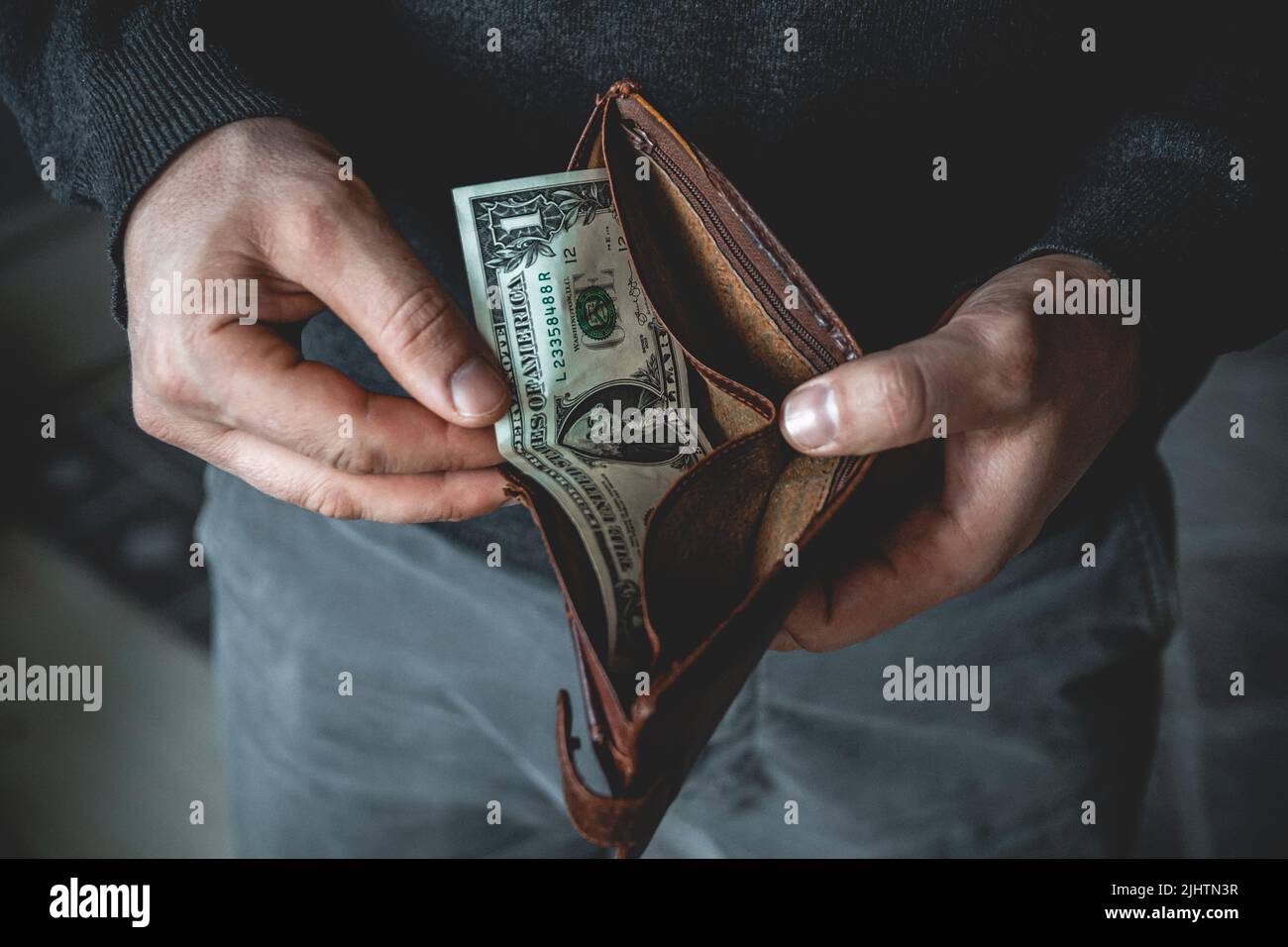 Empty wallet in hand hi-res stock photography and images - Alamy