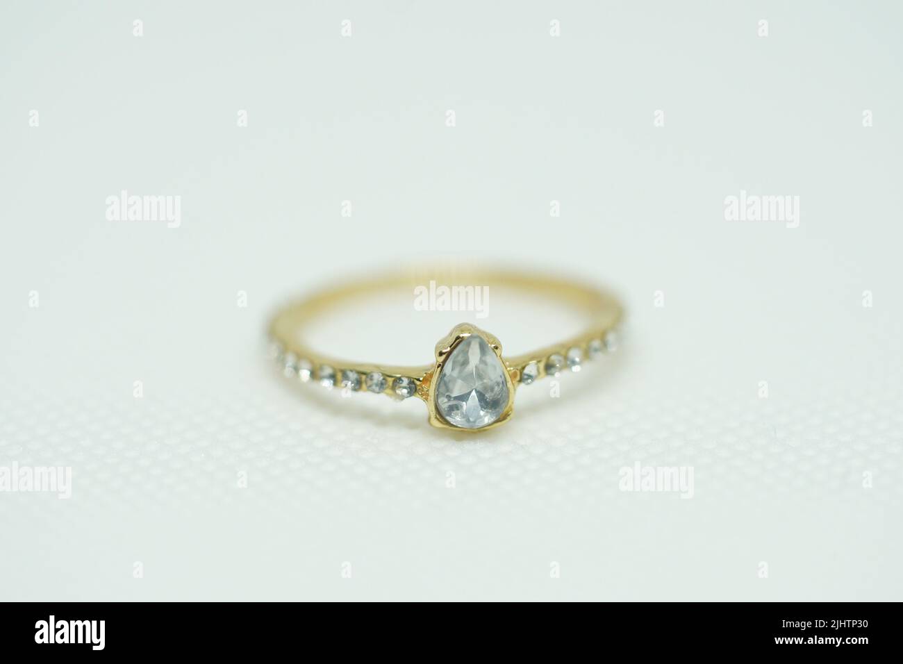 The wedding engagement ring is isolated on white background Stock Photo ...